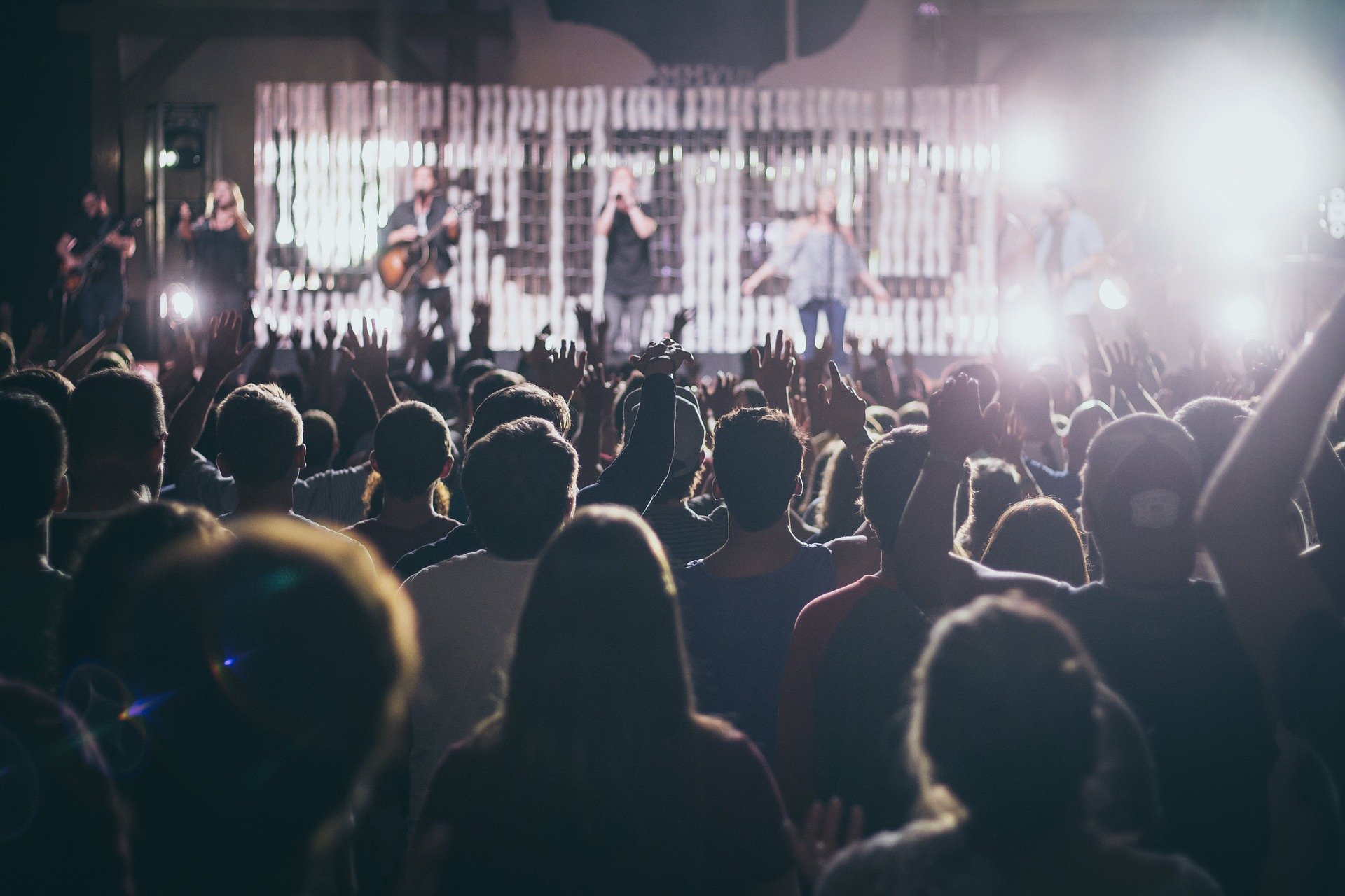 Spotlight: 9 Best Ways to Promote Your Music Band In 2021
